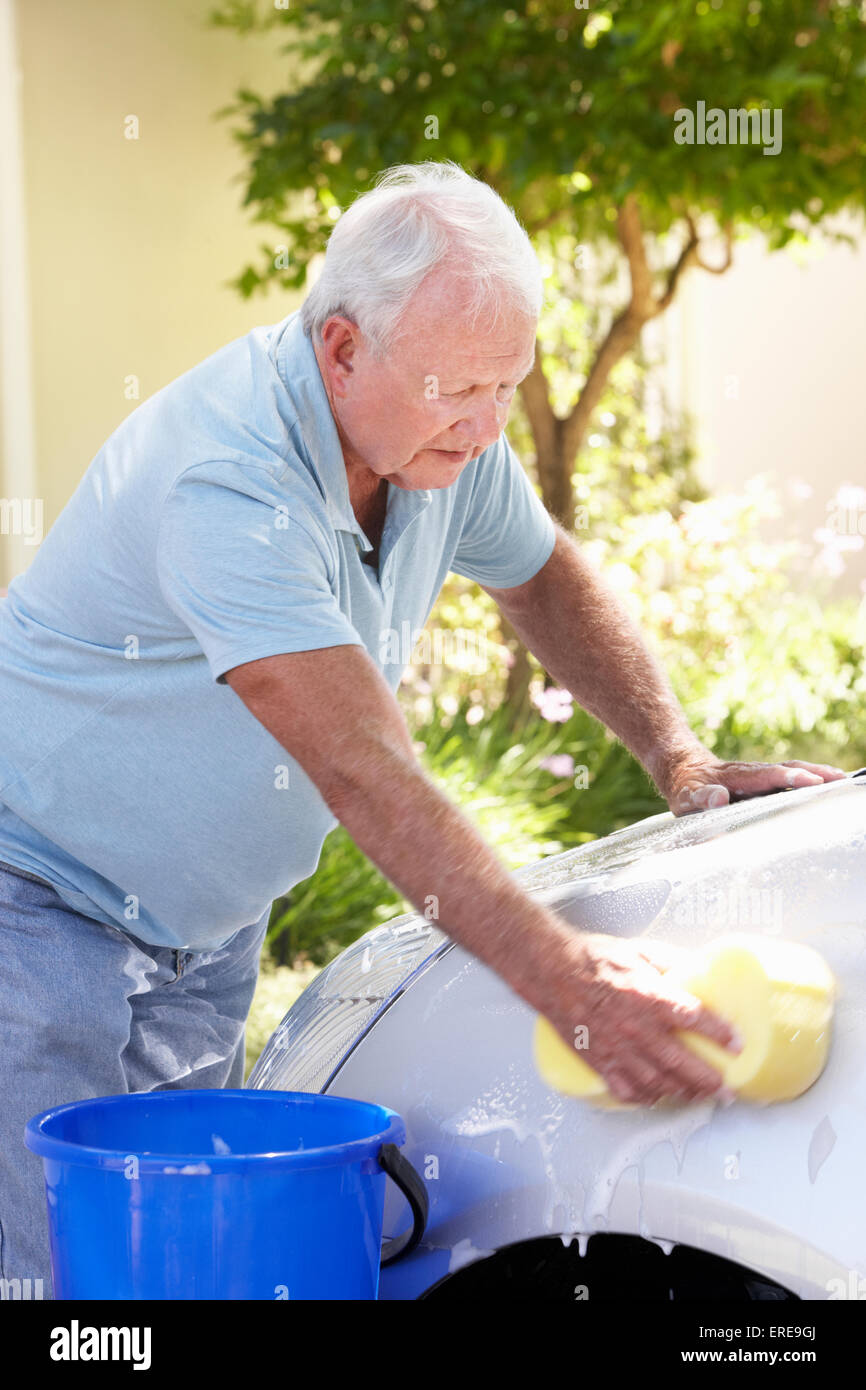 Senior Man Washing Car In Drive Stock Photo - Alamy