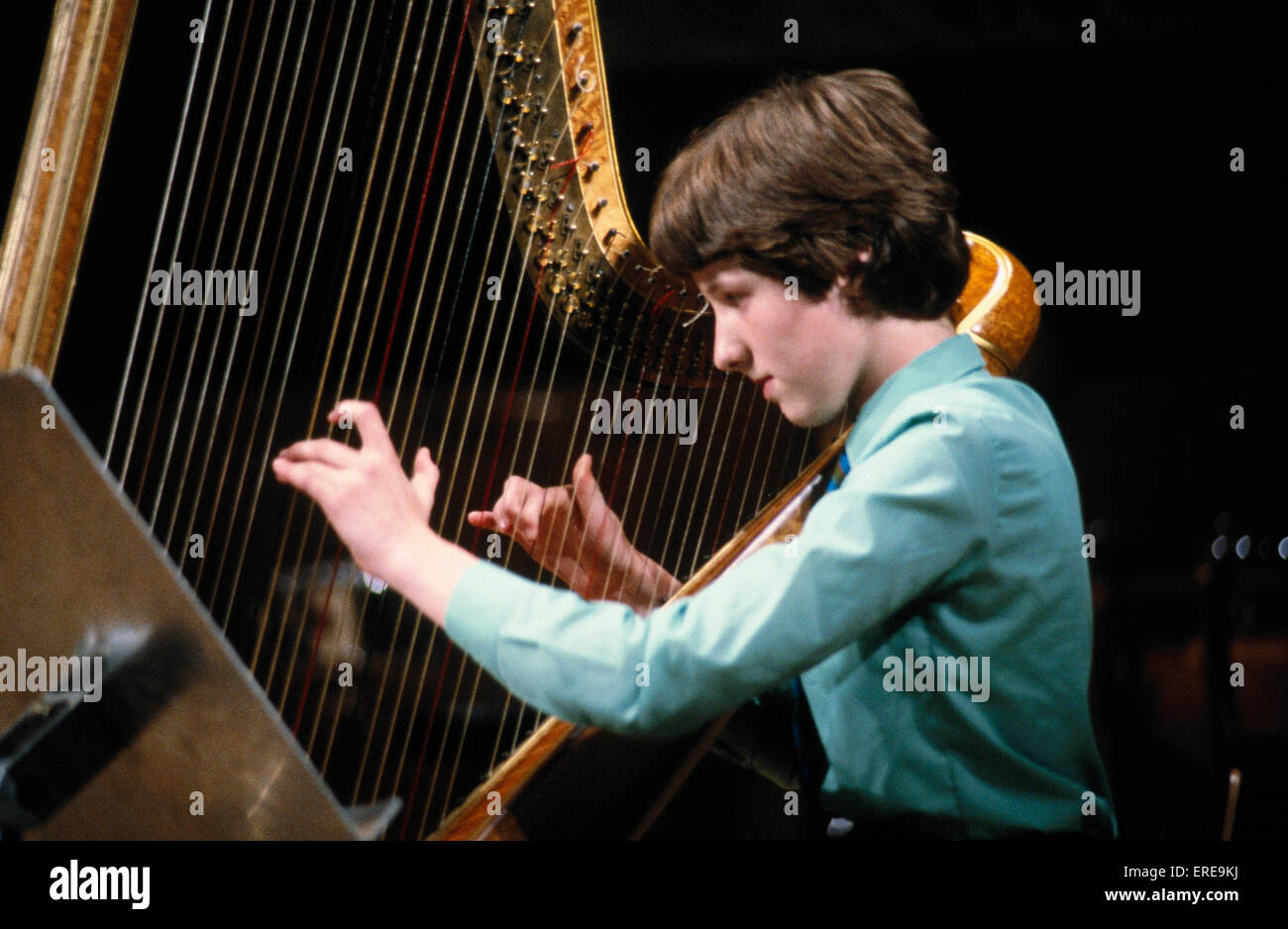 Harpist playing - close up Stock Photo - Alamy