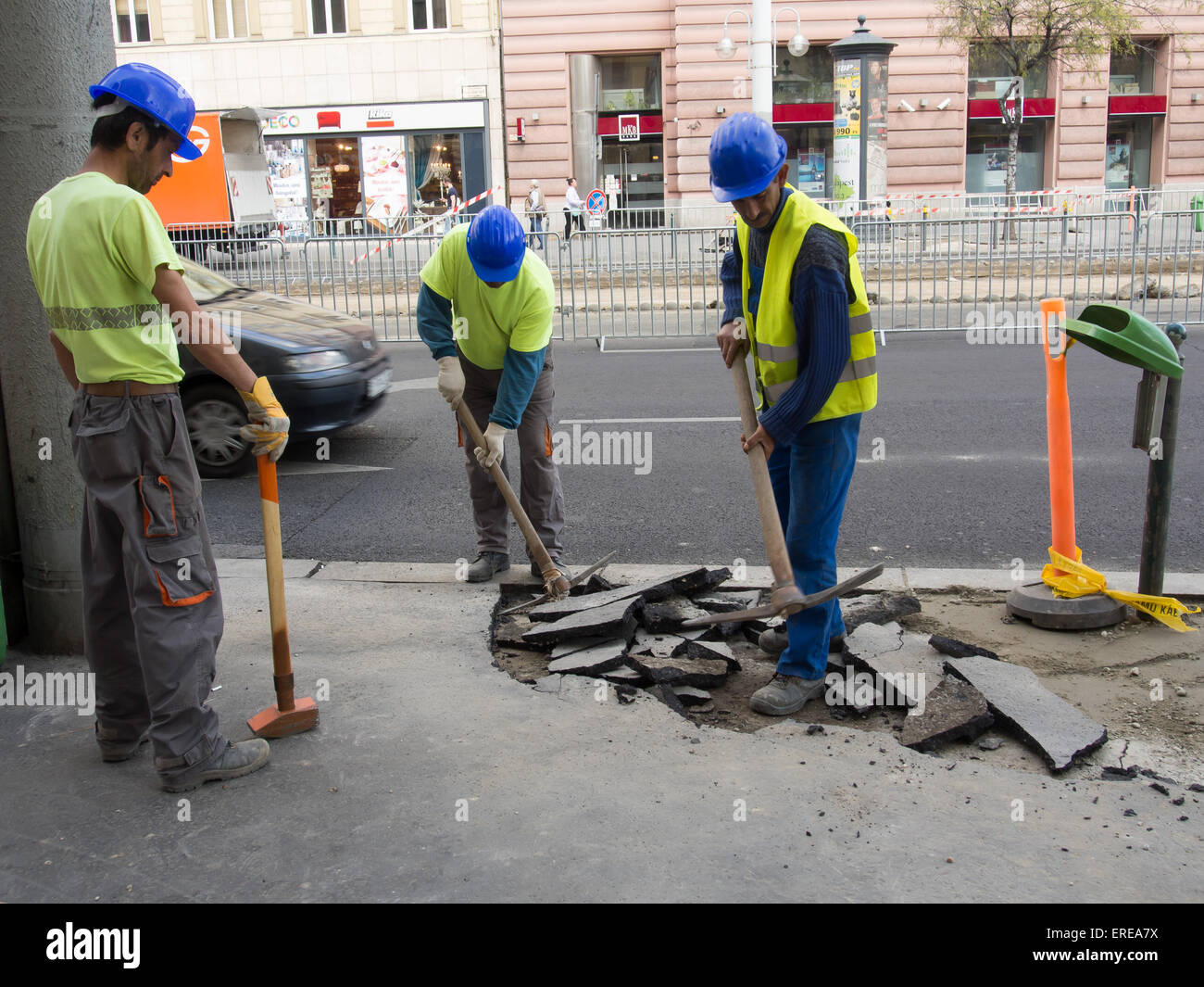 Budapest, Hungary - April 15,2015: Construction workers break concrete ...
