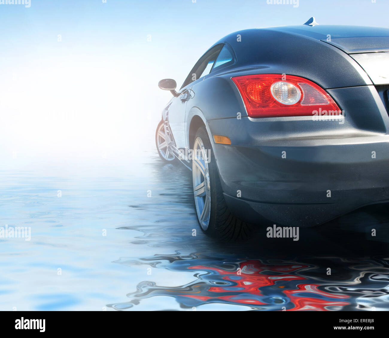 Sport car reflected in water Stock Photo - Alamy