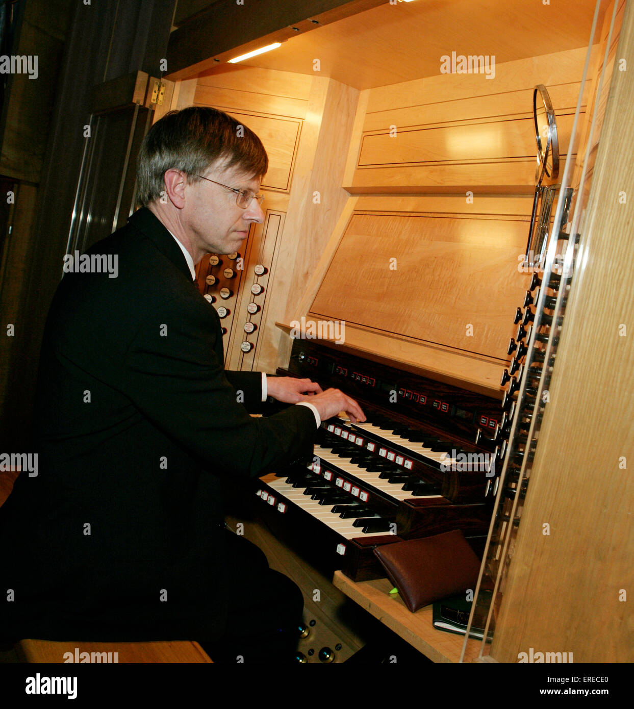 Organist playing a three console organ Stock Photo - Alamy