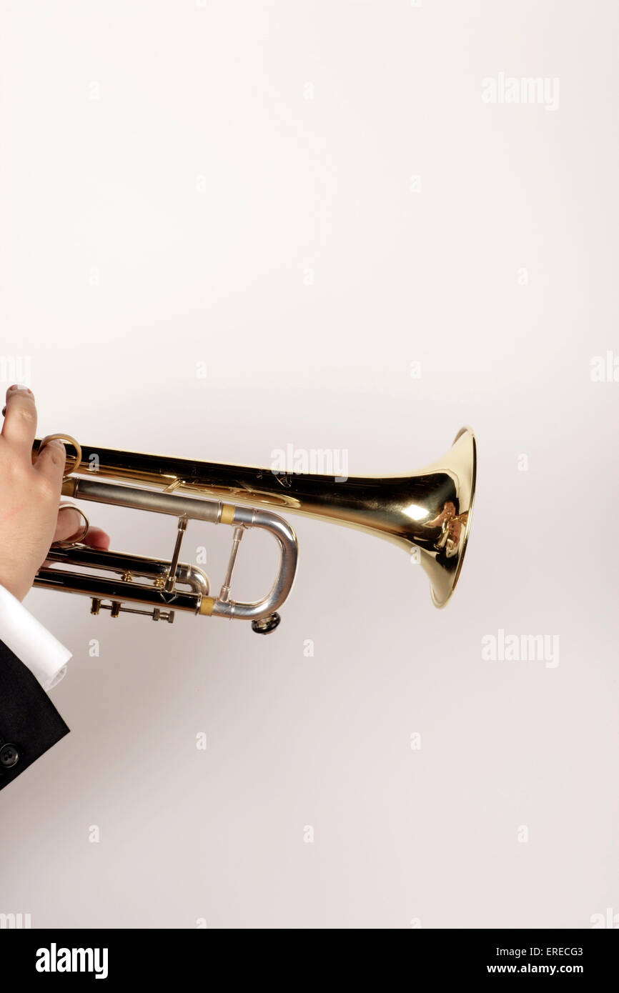 Trumpet being held in one hand, in playing position Stock Photo - Alamy