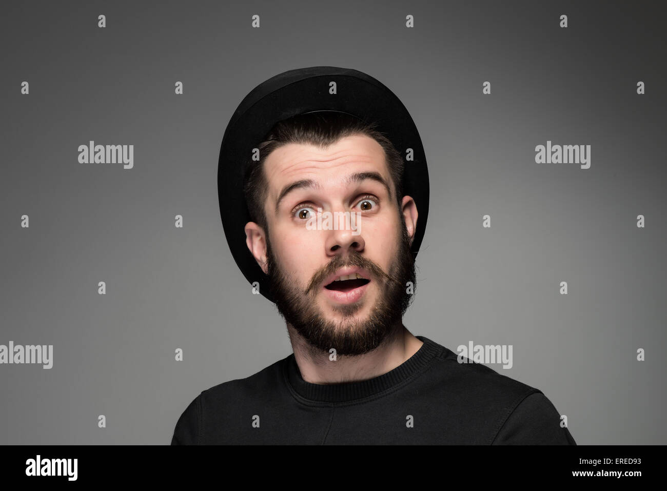 portrait of handsome young surprised man Stock Photo - Alamy
