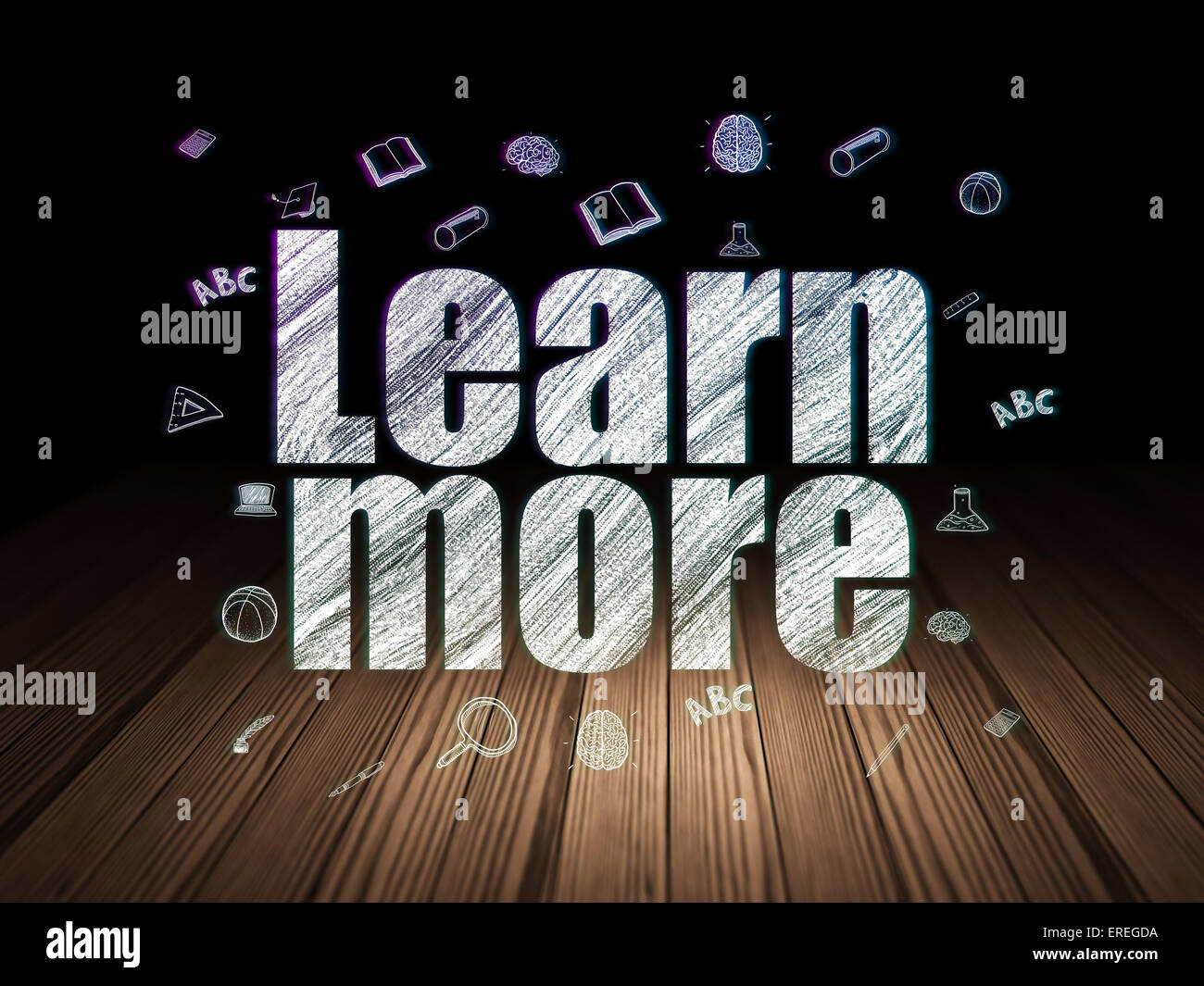 Learning concept: Learn More in grunge dark room Stock Photo - Alamy