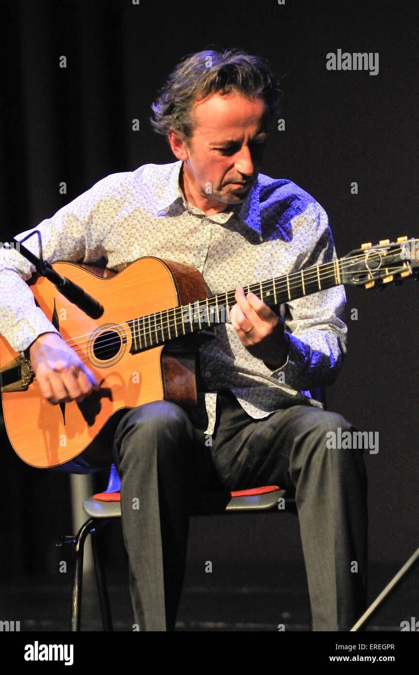 Dave Kelbie playing guitar as part of the Evan Christopher Quartet at ...