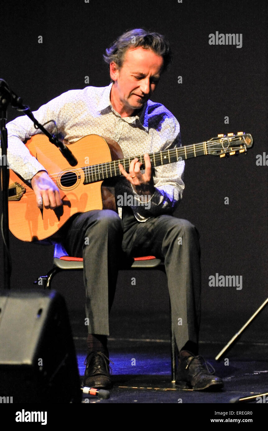 Dave Kelbie playing guitar as part of the Evan Christopher Quartet at ...