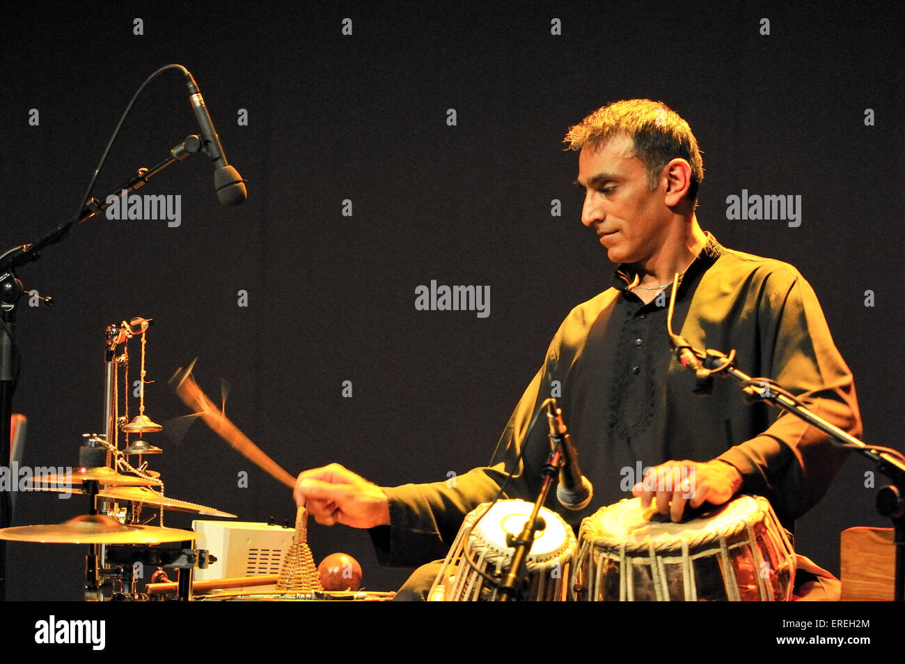 Kuljit Bhamra playing various Indian percussion instruments at the ...