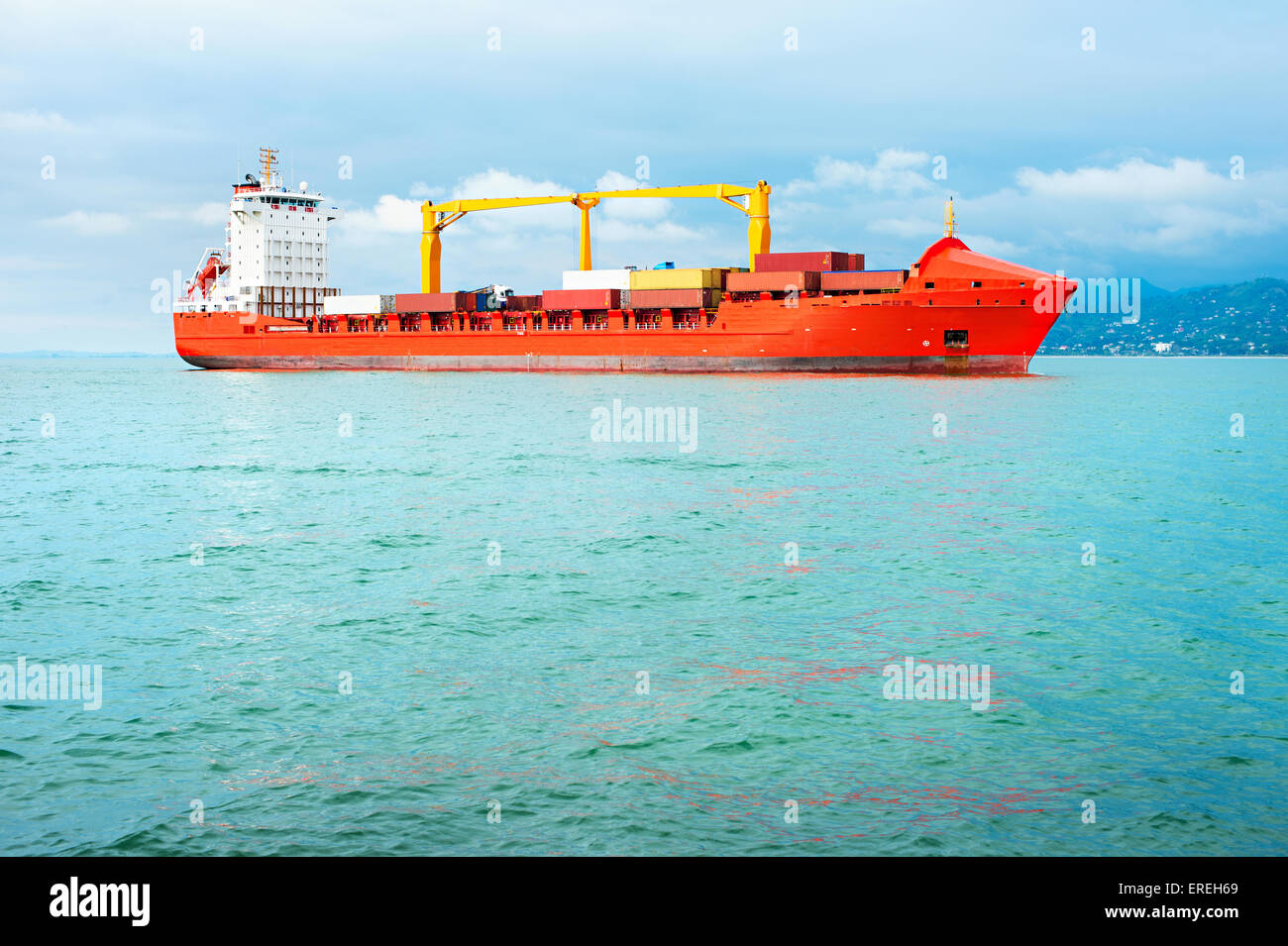 Red cargo ship in the Batumi harbor, Georgia Stock Photo - Alamy