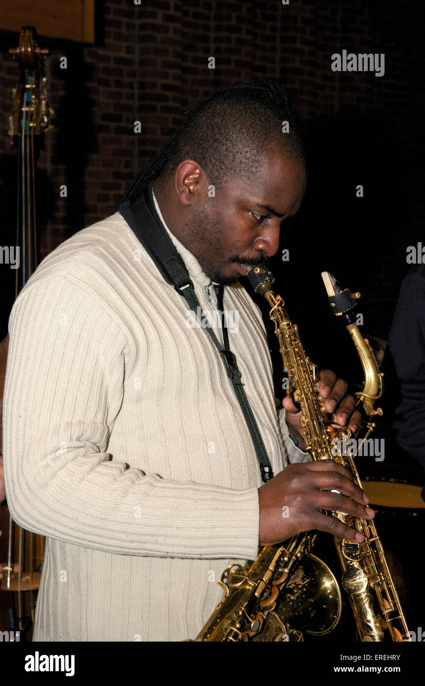 Jason Yarde playing soprano saxophone during sound checks with ...