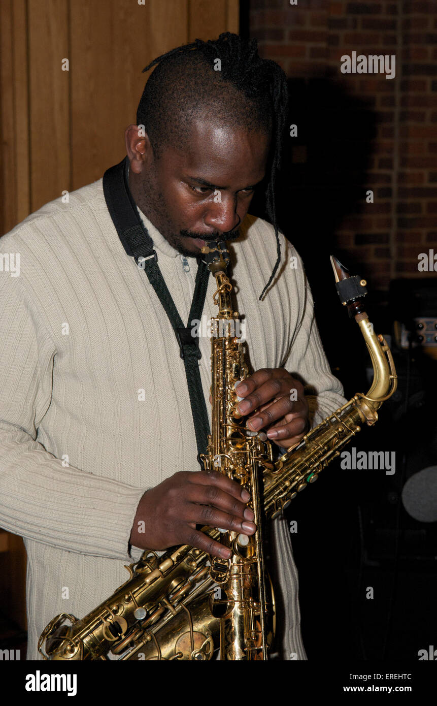 Jason Yarde playing soprano saxophone during sound checks with ...