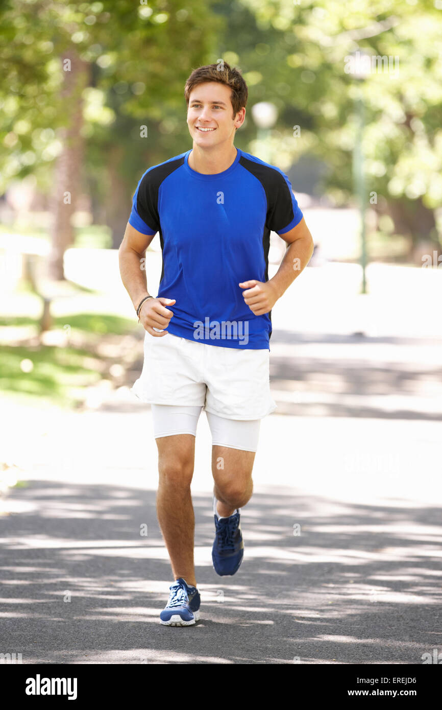 Man Running Through Park Stock Photo - Alamy