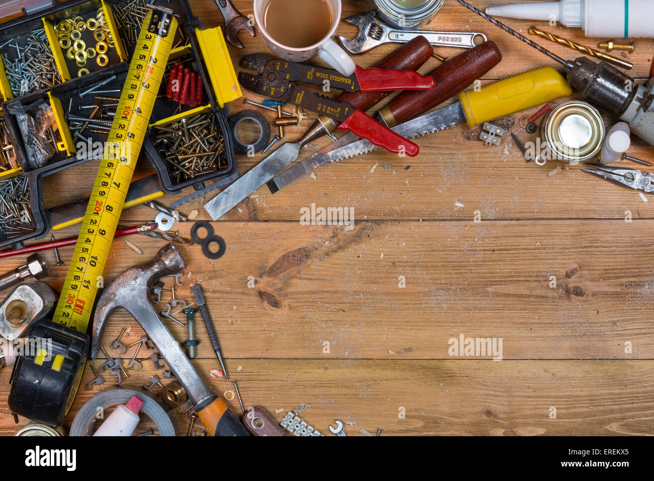 Home maintenance - An untidy workbench full of dusty old tools and ...