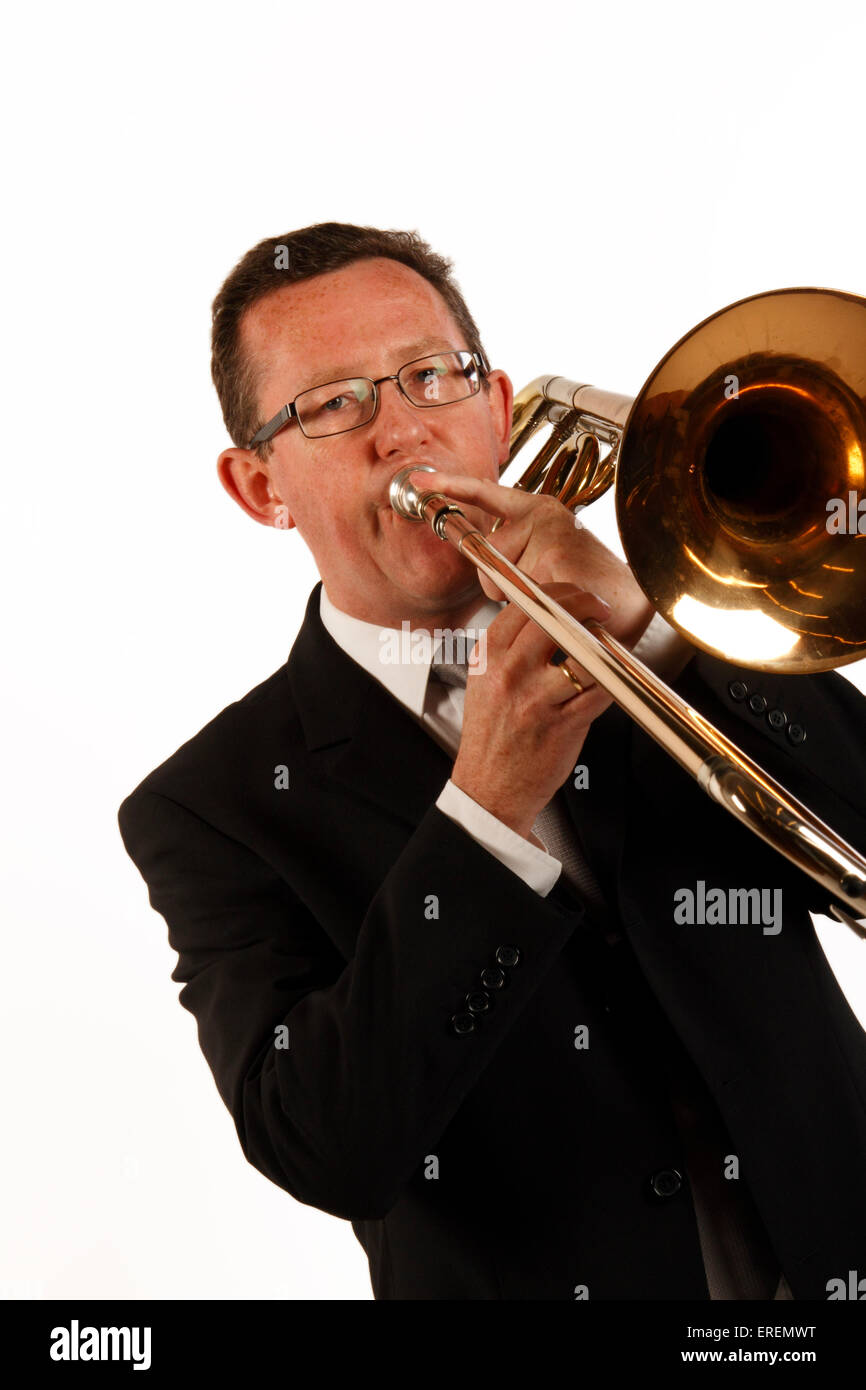 Tenor Trombone player in playing position Stock Photo - Alamy