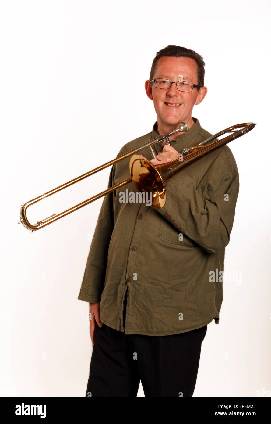 Player holding an Alto trombone in closed position to show length Stock ...