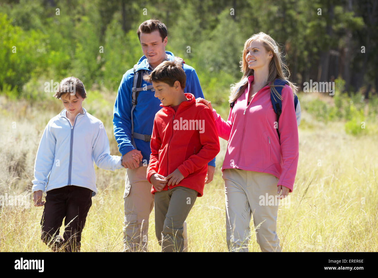 Family On Hike In Beautiful Countryside Stock Photo - Alamy