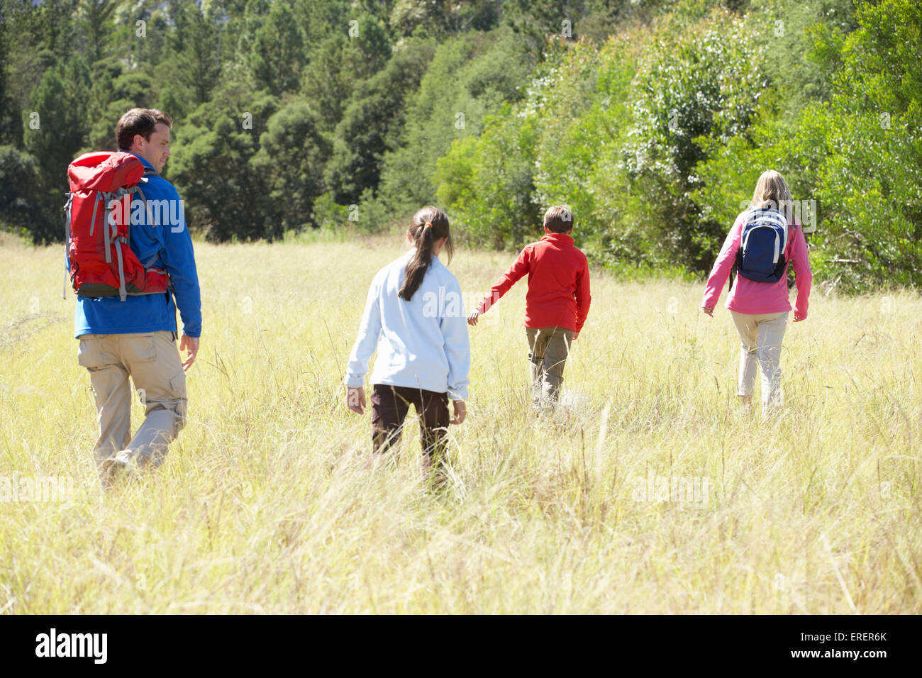 Family On Hike In Beautiful Countryside Stock Photo - Alamy