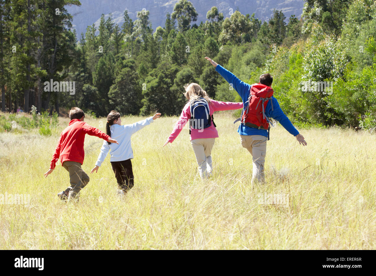Family On Hike In Beautiful Countryside Stock Photo - Alamy