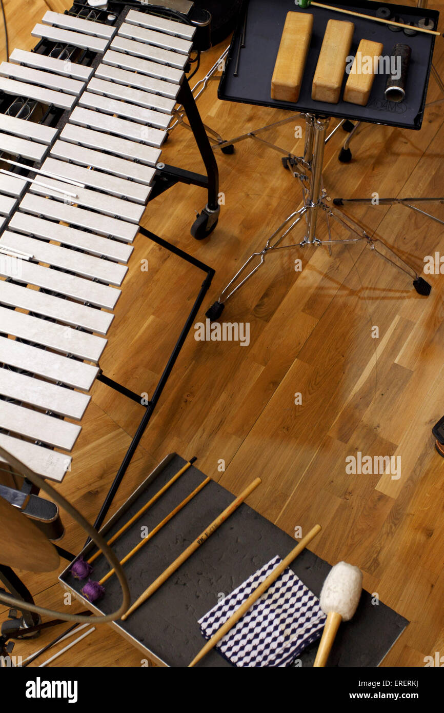 A percussion set-up on stage including a vibraphone, wood blocks ...