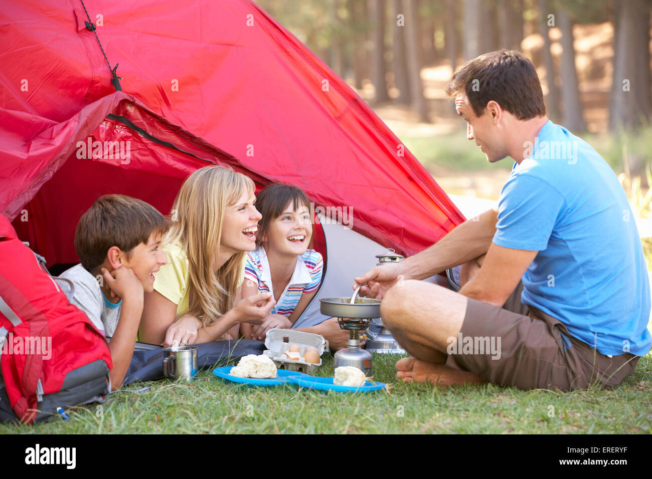 Family Cooking Breakfast On Camping Holiday Stock Photo - Alamy