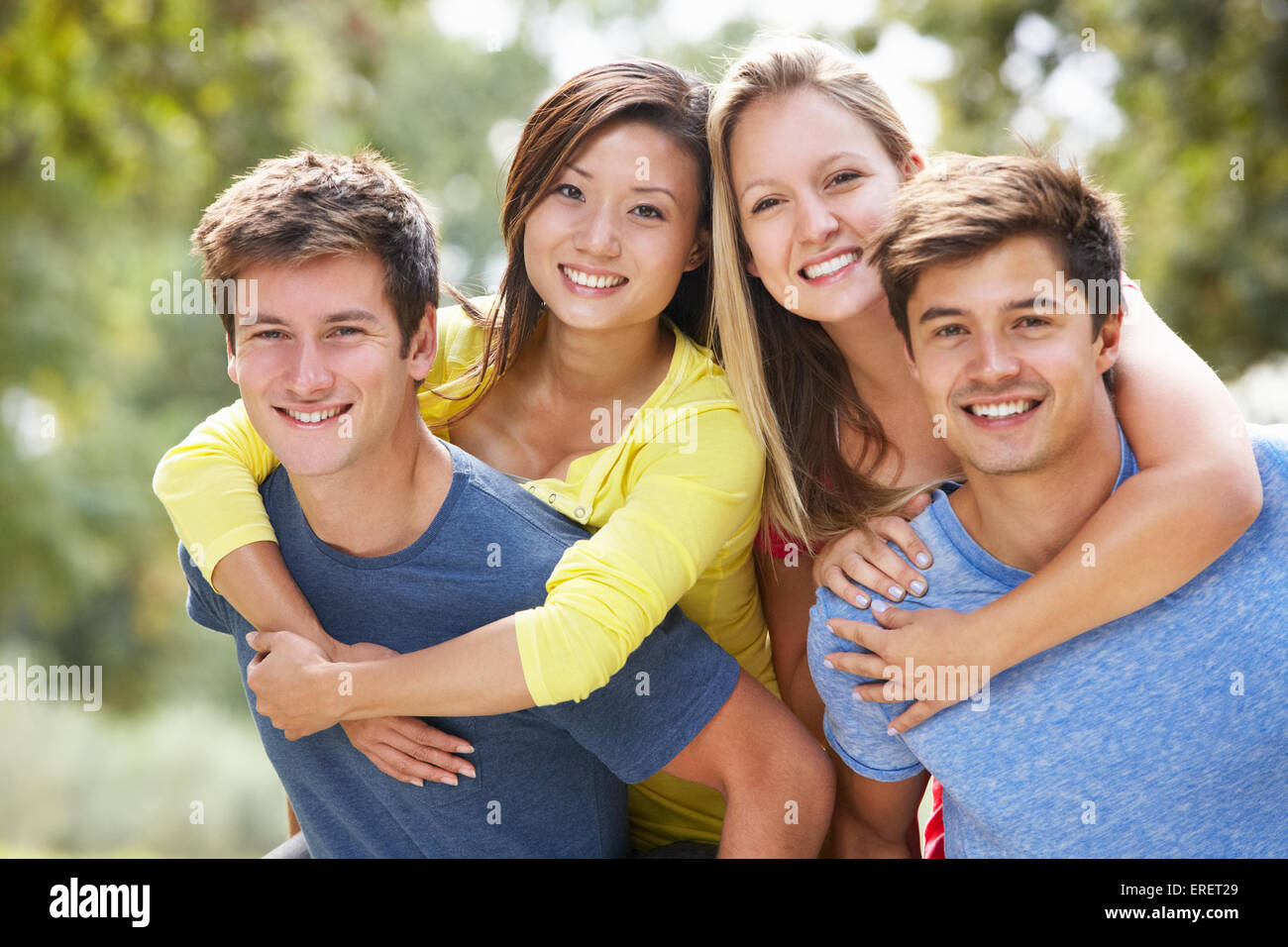 Group Of Young Friends Having Fun In The Countryside Stock Photo - Alamy