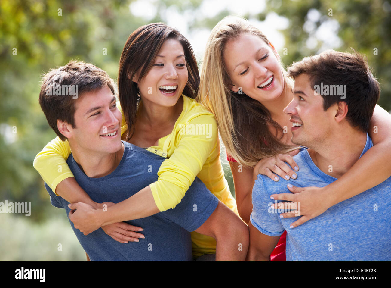 Group Of Young Friends Having Fun In The Countryside Stock Photo - Alamy