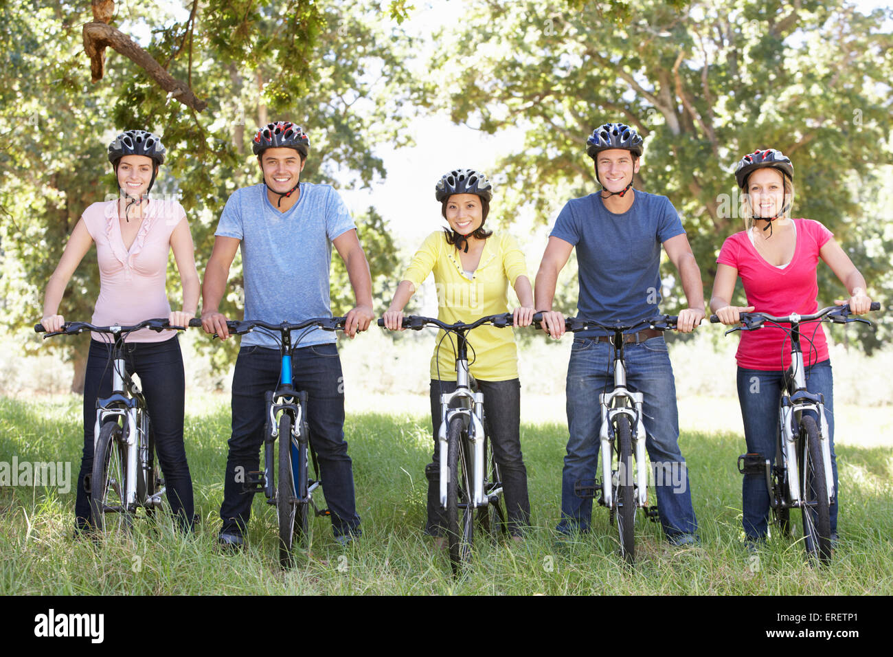 Group Of Young Friends On Cycle Ride In Countryside Stock Photo - Alamy