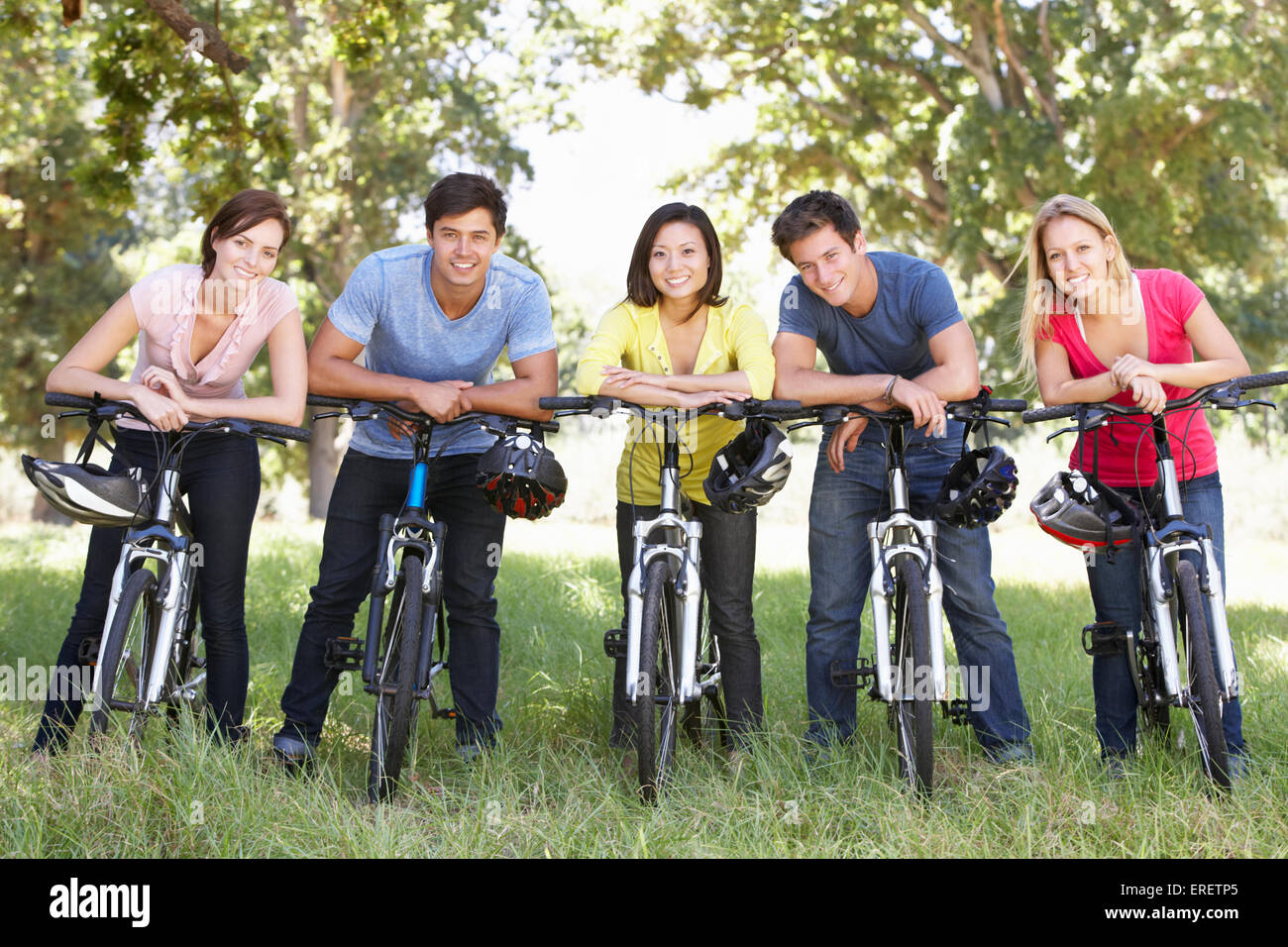 Group Of Young Friends On Cycle Ride In Countryside Stock Photo - Alamy