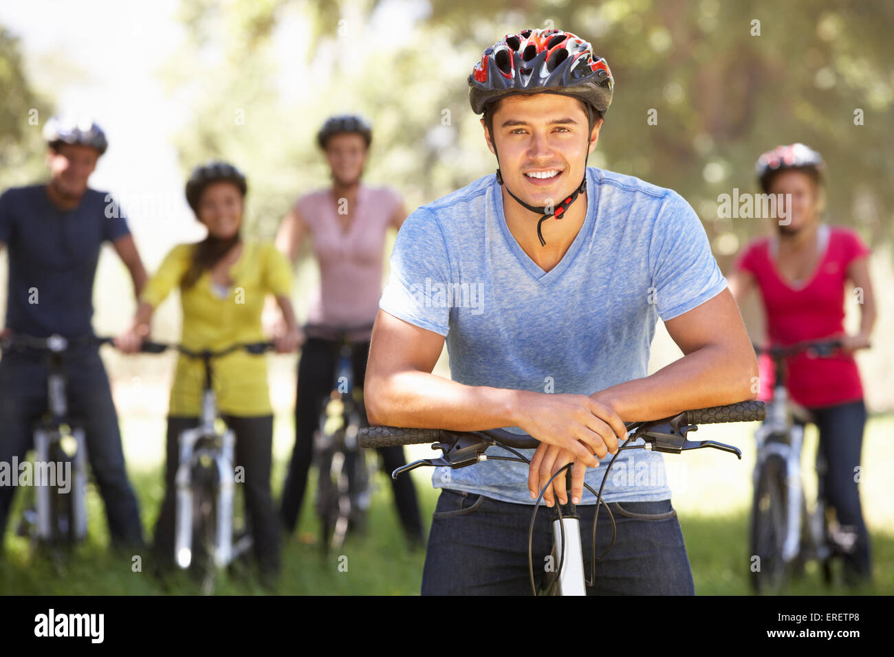 Group Of Young Friends On Cycle Ride In Countryside Stock Photo - Alamy