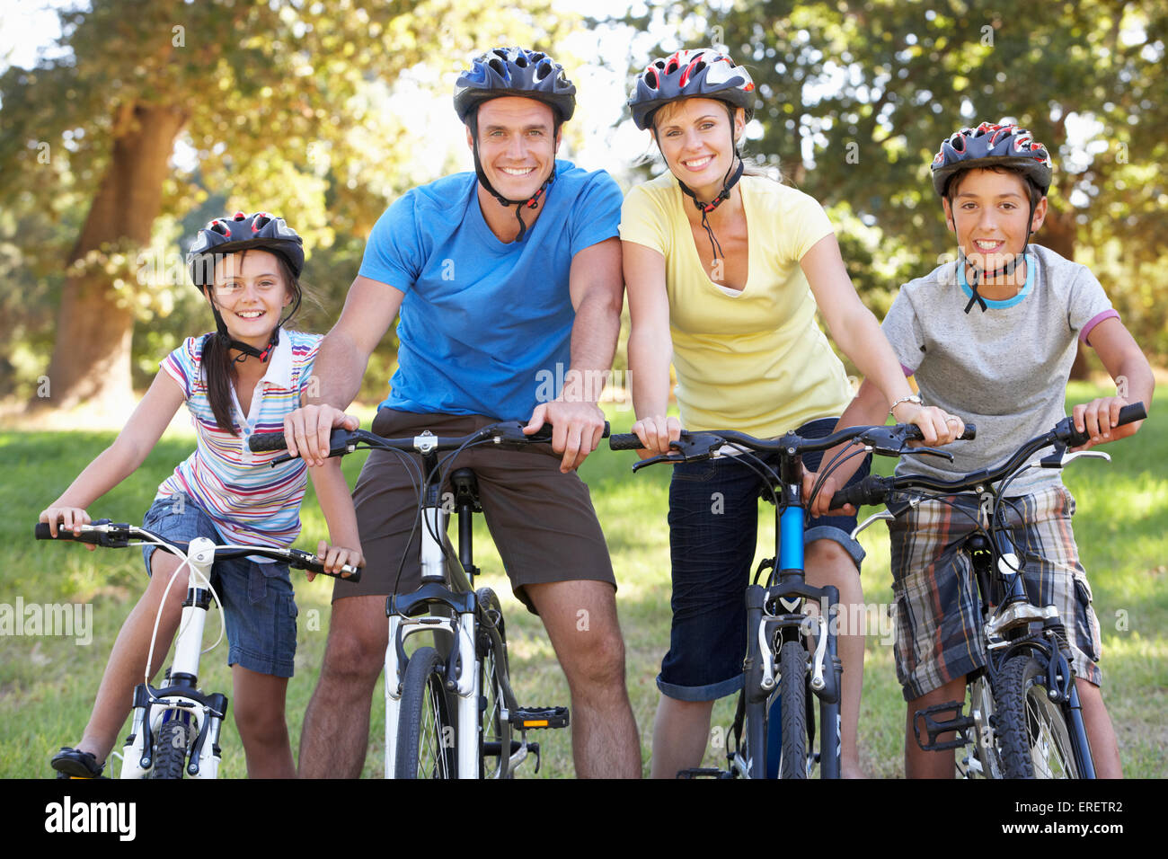 Family On Cycle Ride In Countryside Stock Photo - Alamy