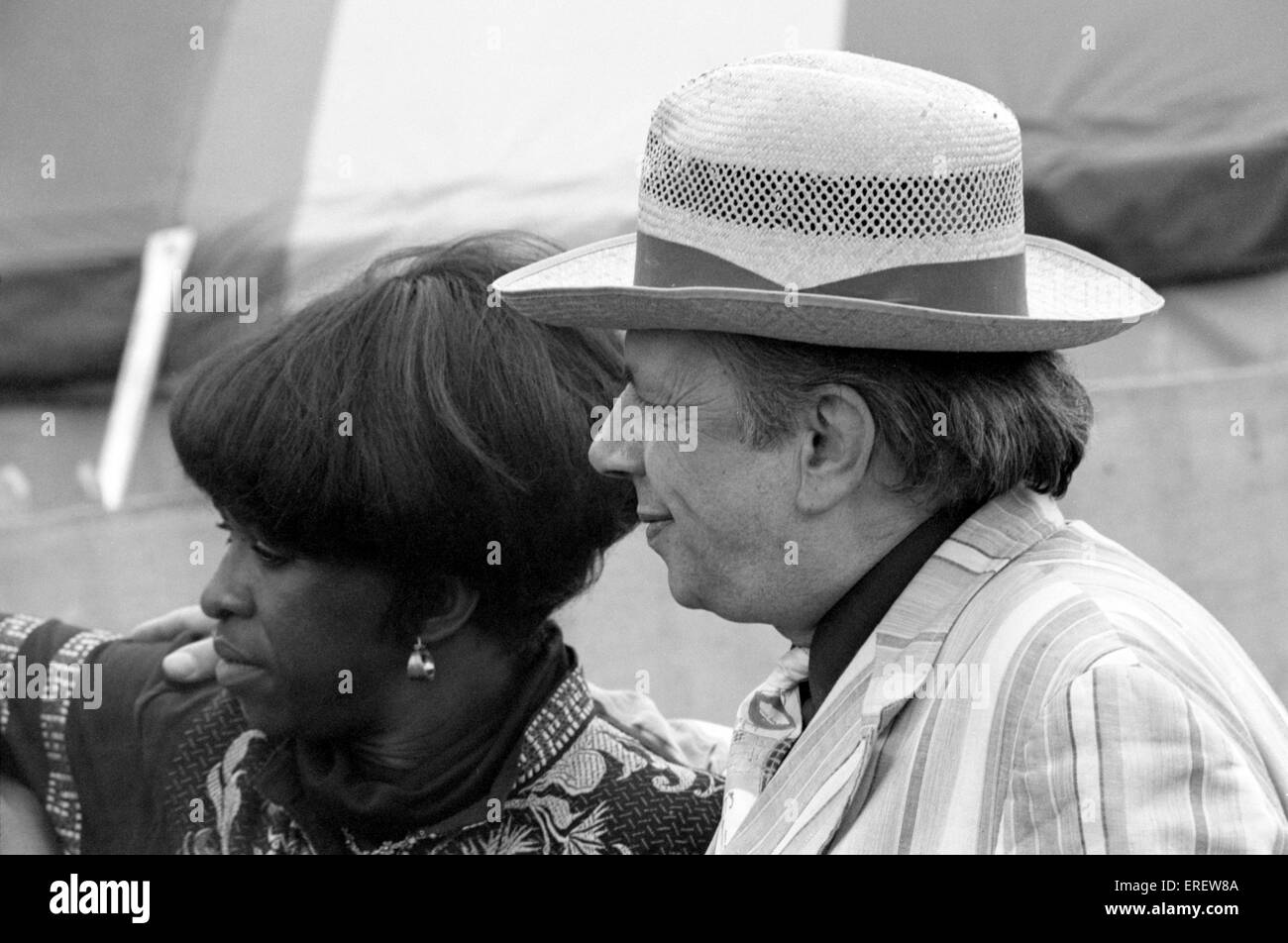 English jazz and blues singer George Melly sitting among the audience ...