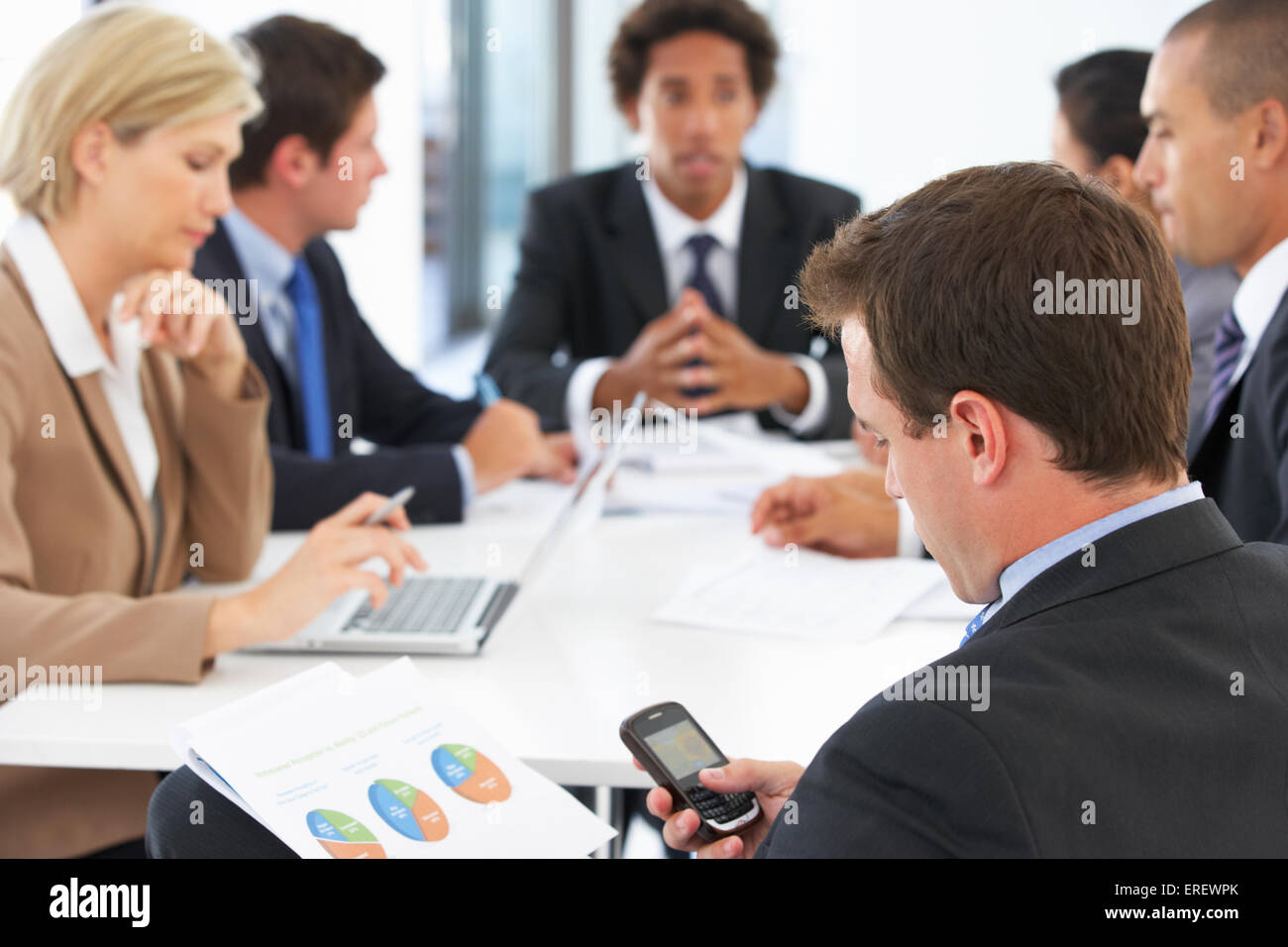 Person texting during meeting hi-res stock photography and images - Alamy