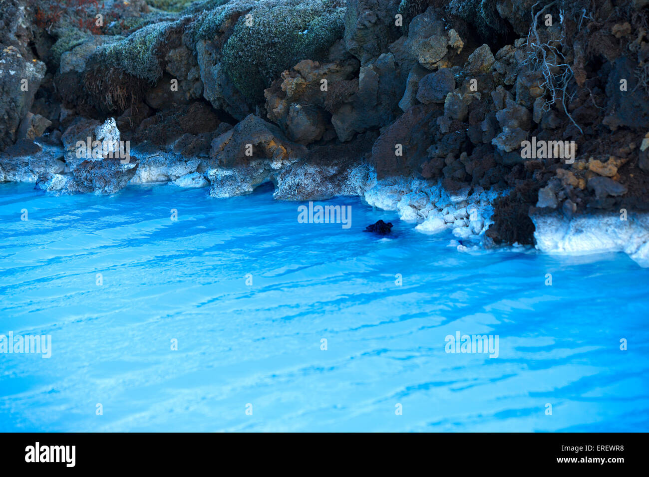 Milky and blue water of the geothermal bath Blue Lagoon in Iceland ...