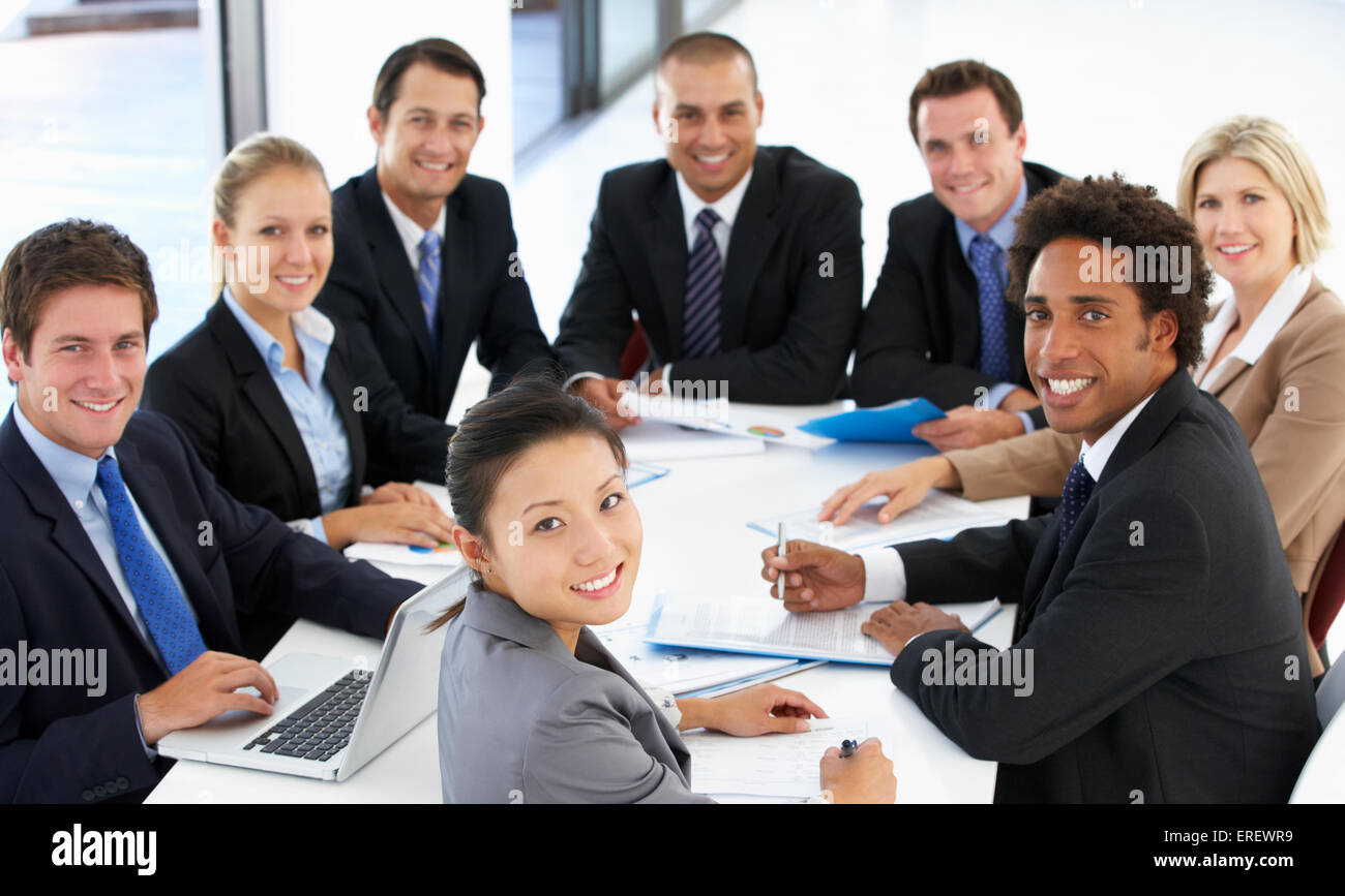 Portrait Of Business People Having Meeting In Office Stock Photo - Alamy