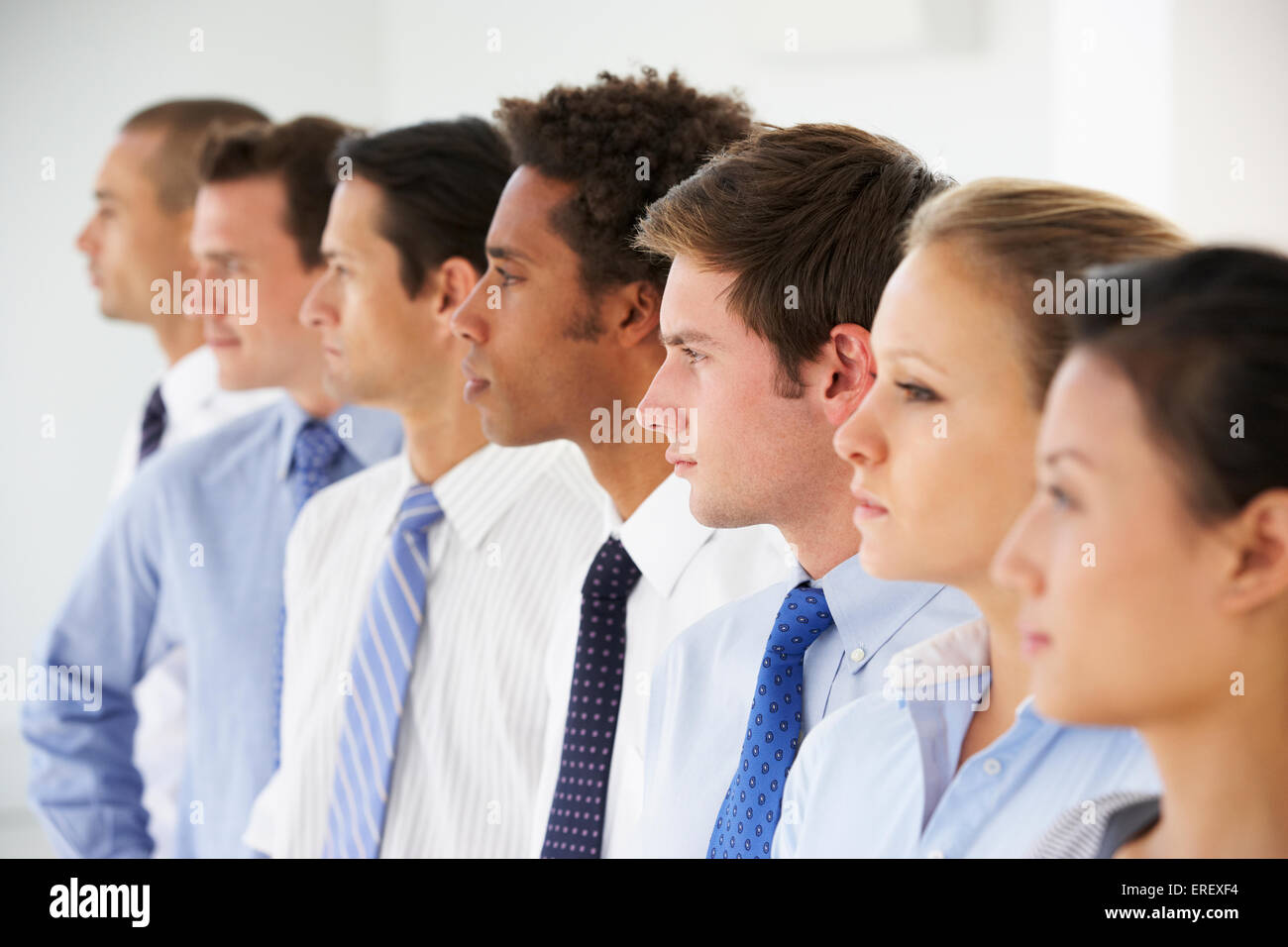 Line Of Business People Looking Ahead Stock Photo - Alamy