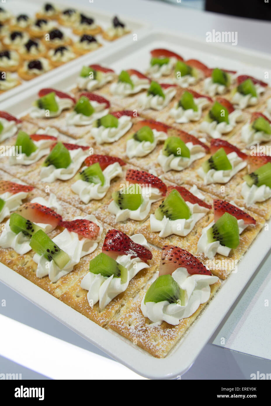 cocktail party canapé fruit desert cream tray Stock Photo - Alamy