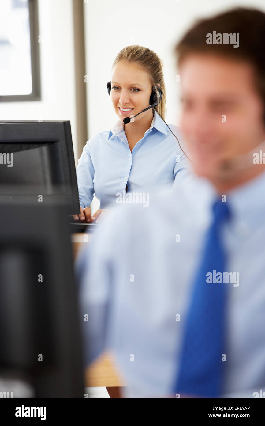 Talking with a customer and desk hi-res stock photography and images ...