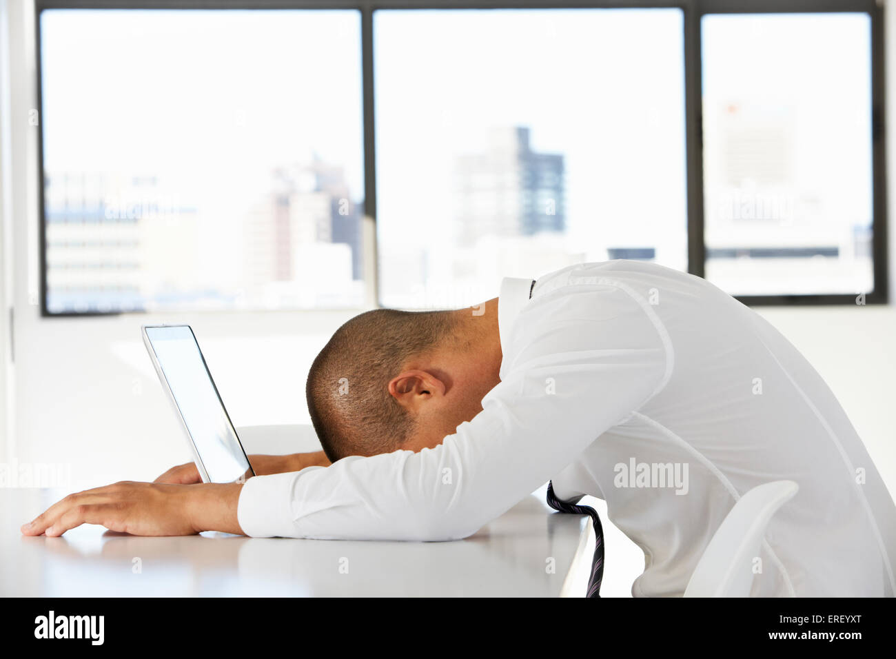 Young frustrated businessman sitting hi-res stock photography and ...