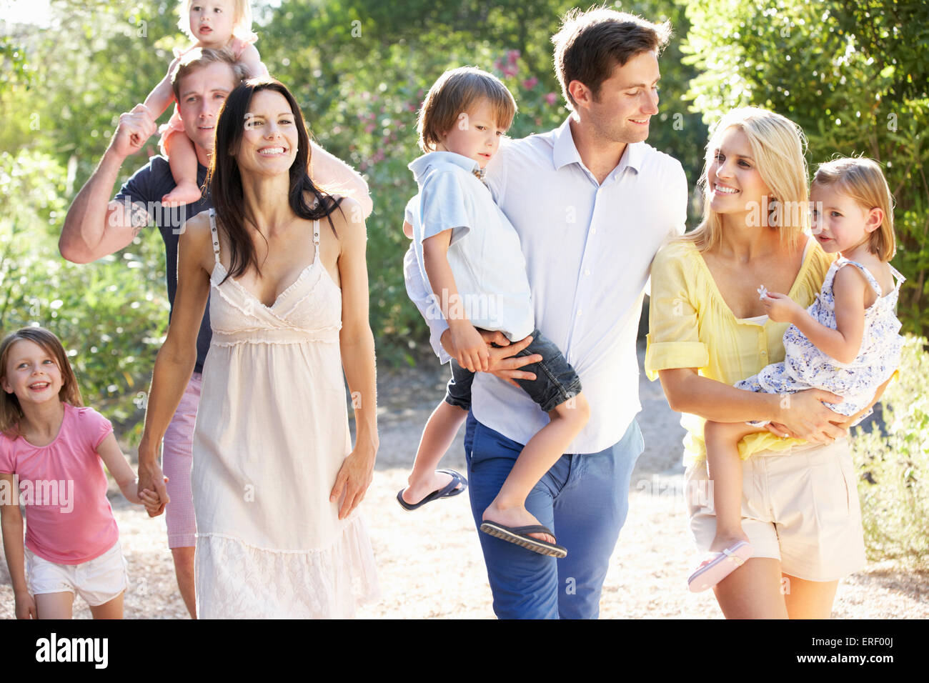 Two Families On Country Walk Together Stock Photo - Alamy