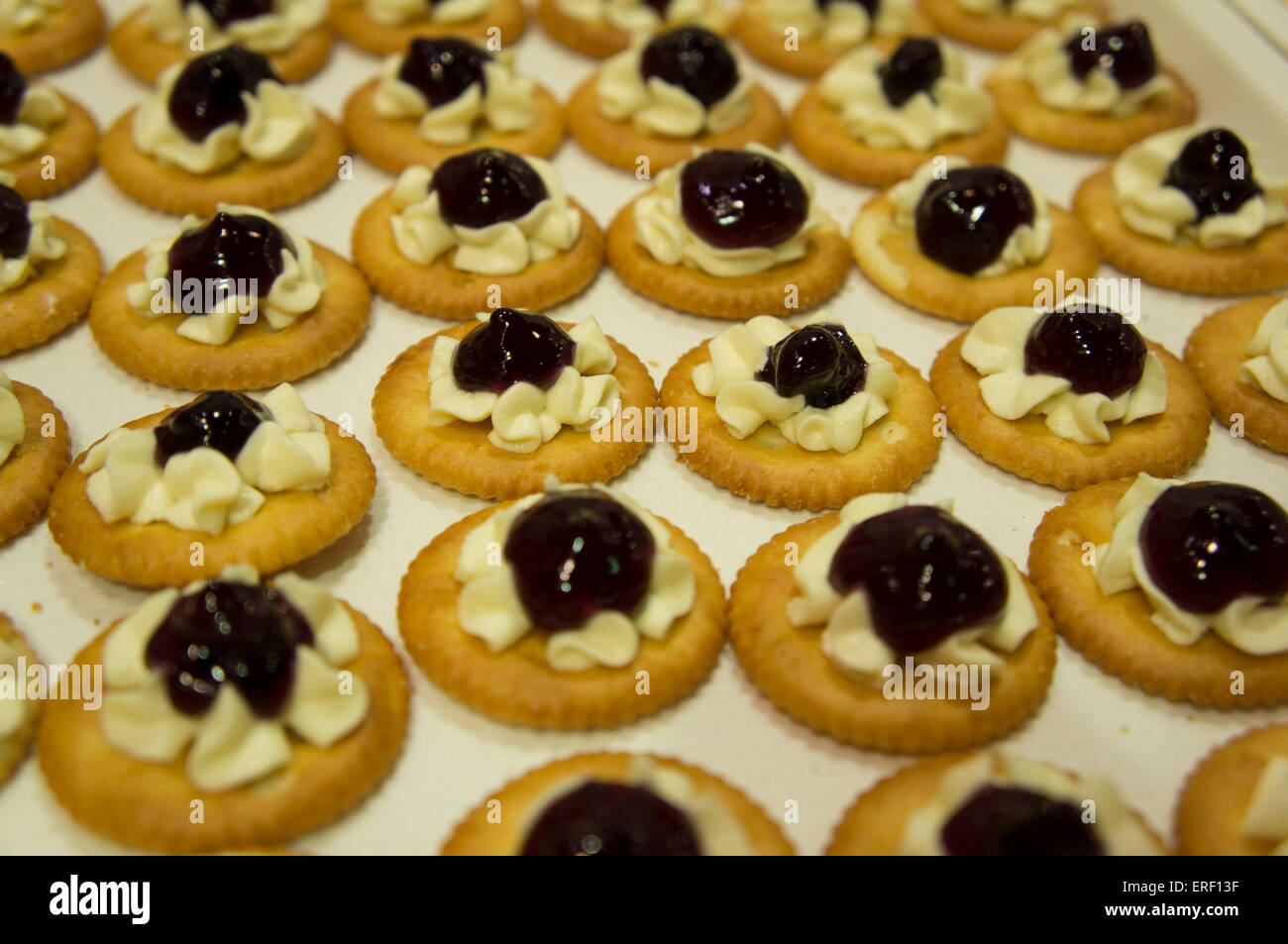 cocktail party canapé fruit desert cream tray Stock Photo - Alamy