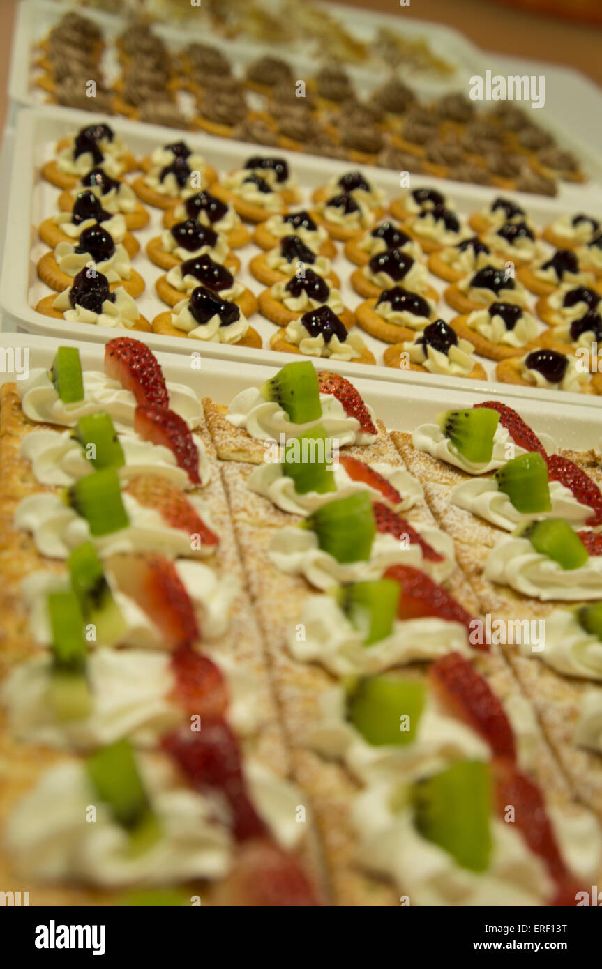 cocktail party canapé fruit desert cream tray Stock Photo - Alamy