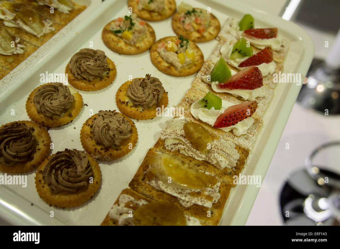 cocktail party canapé fruit desert cream tray Stock Photo - Alamy