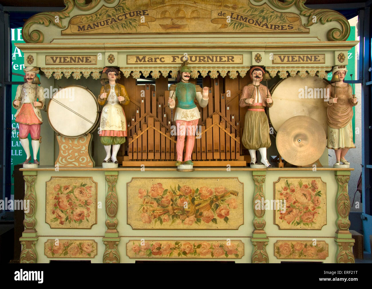 Detail of colourful animated figures on a large barrel organ pictured ...
