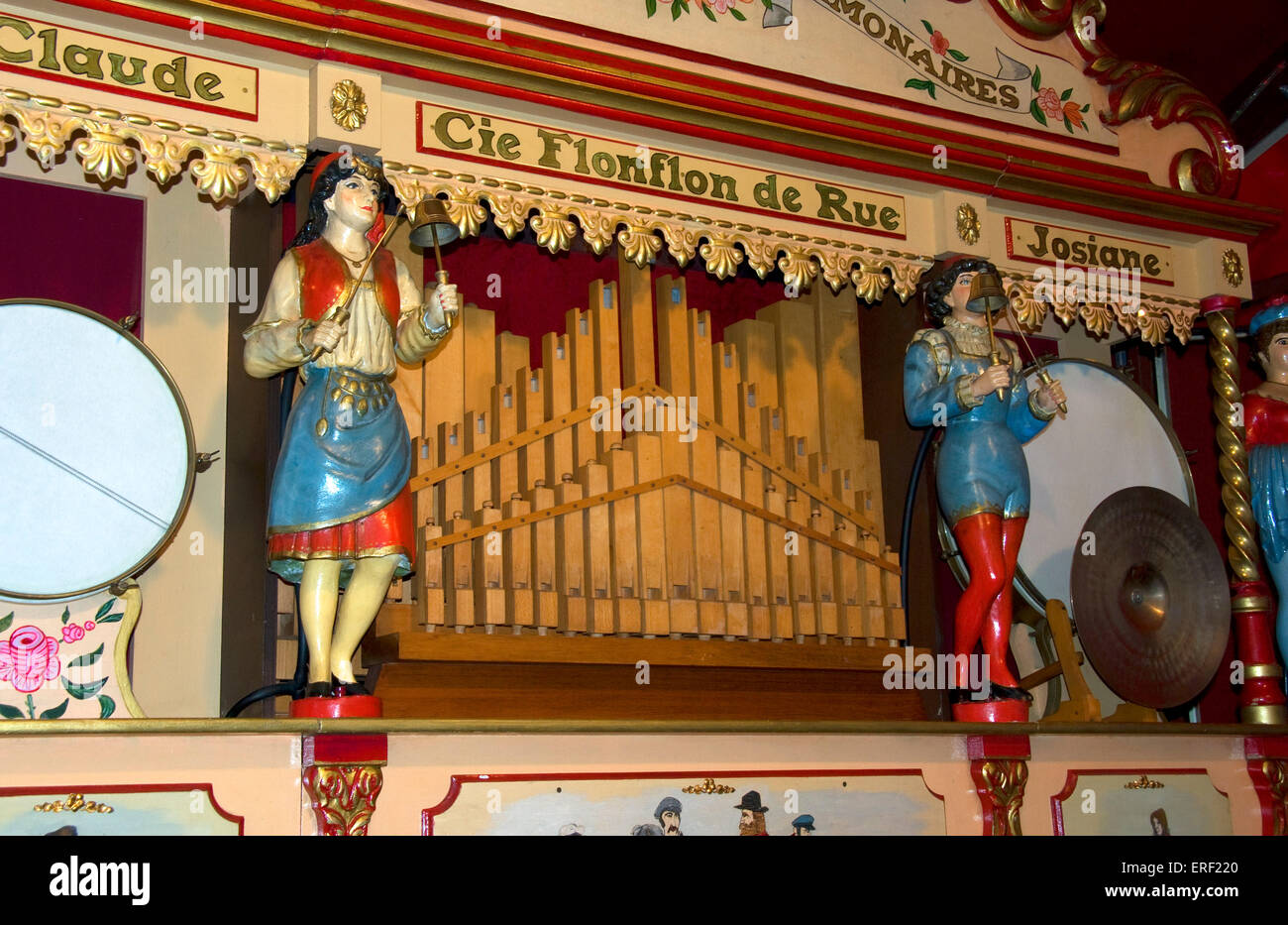 Detail of colourful animated figures on a large barrel organ pictured ...