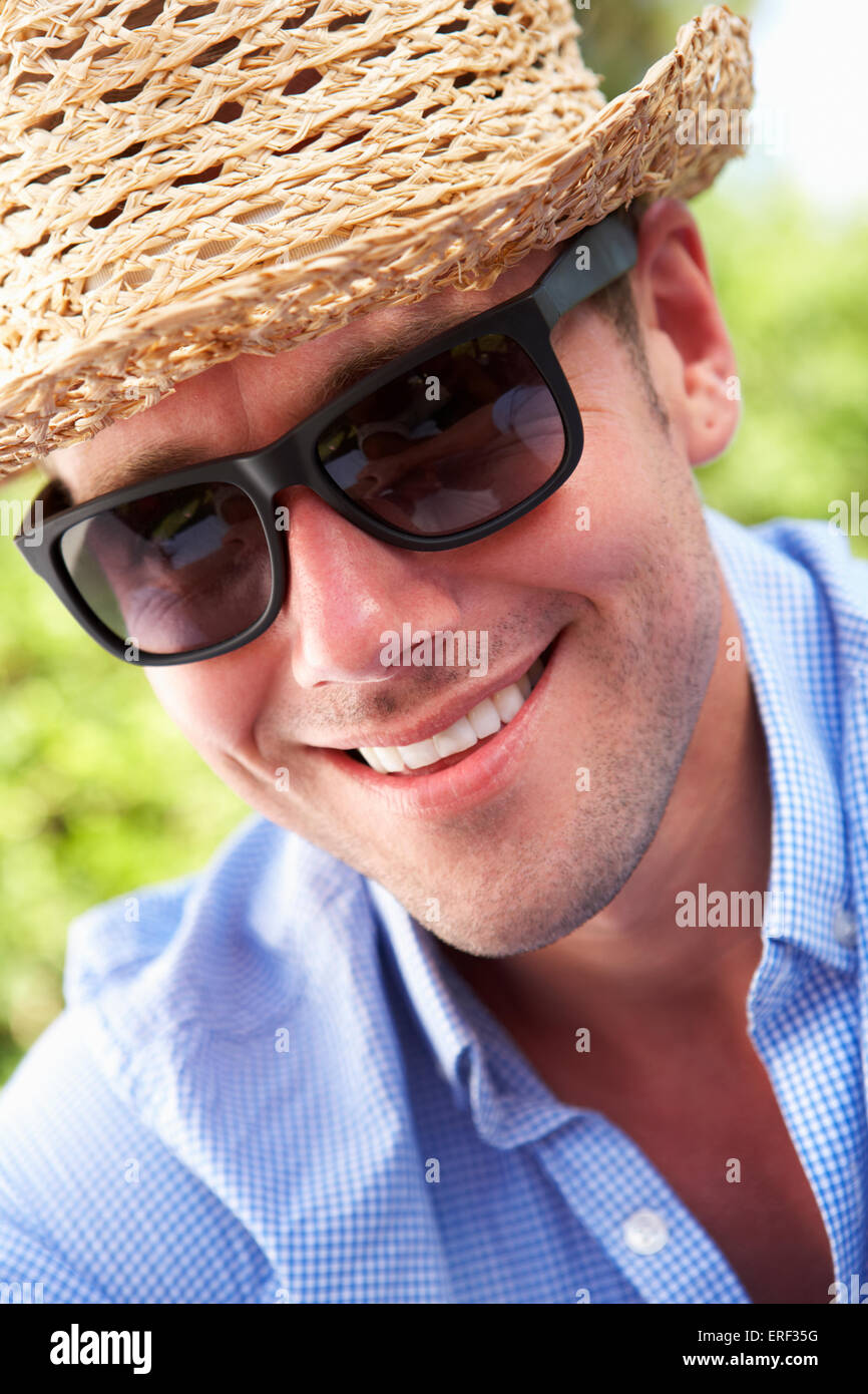 Head And Shoulders Portrait Of Smiling Man With Sun Hat Stock Photo - Alamy
