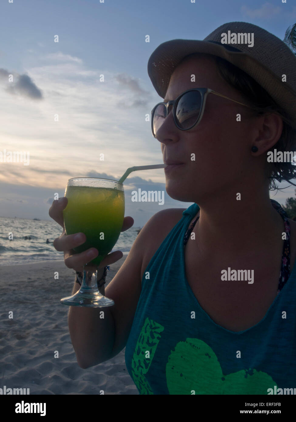 Tourist drinking a cocktail on the beach in Boracay, Philippines Stock ...