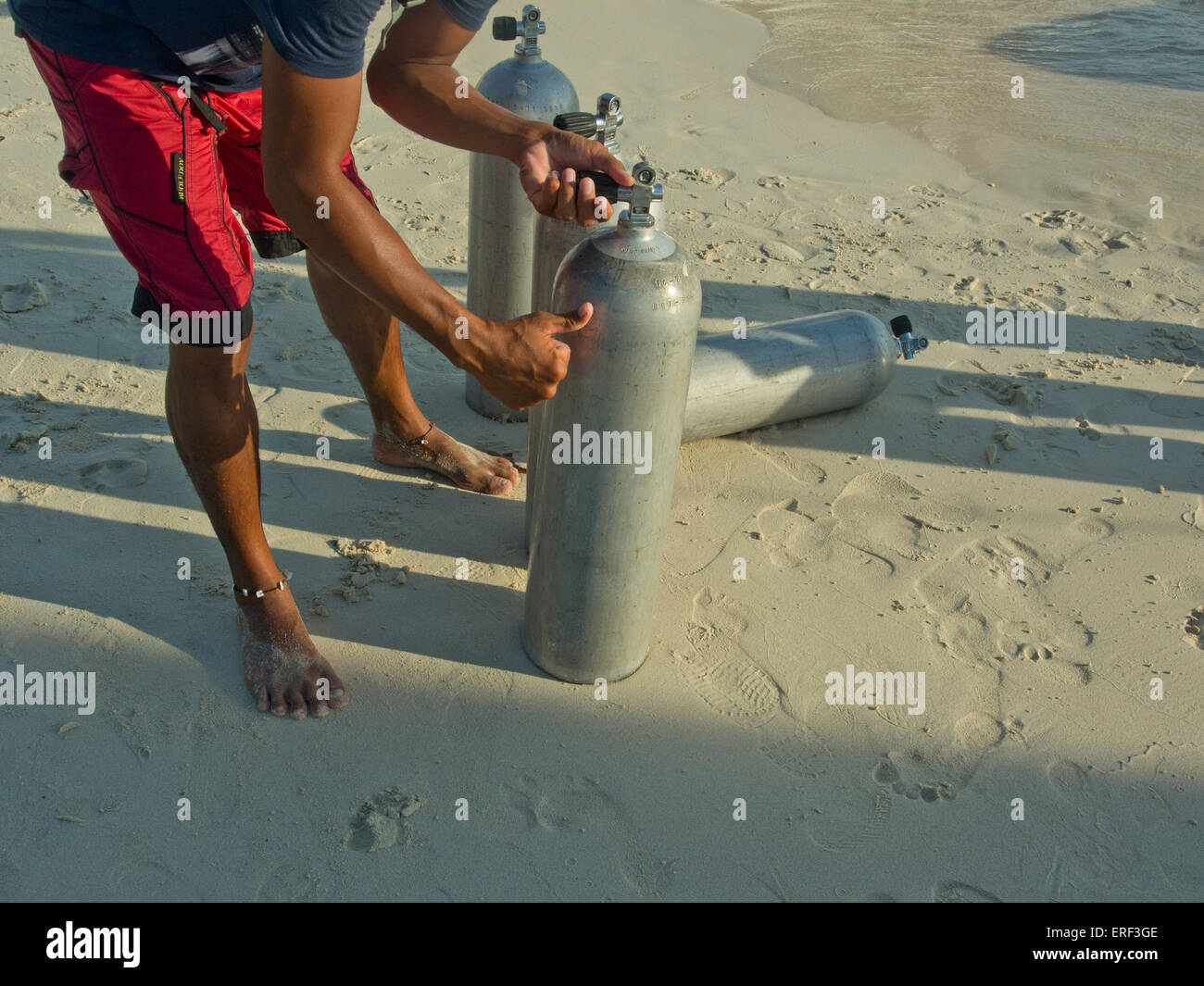 Diving instructor sorting out tanks in Boracay, Philippines Stock Photo ...
