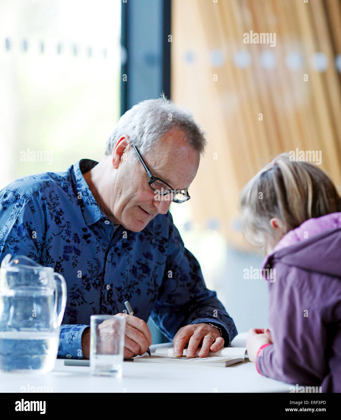 Signing childrens books hi-res stock photography and images - Alamy