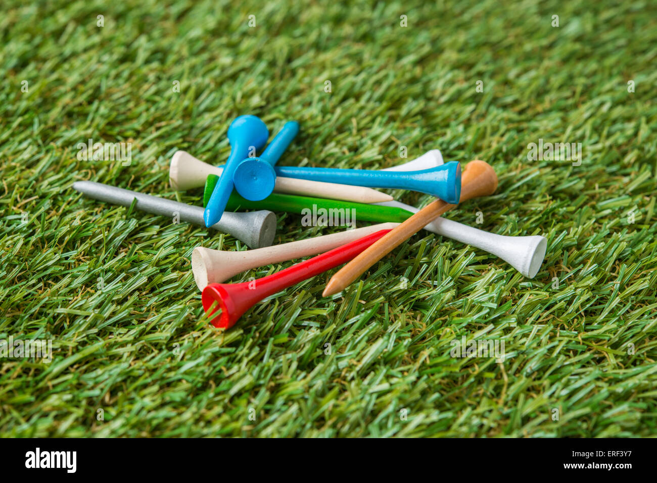 golf wood tee on grass Stock Photo - Alamy