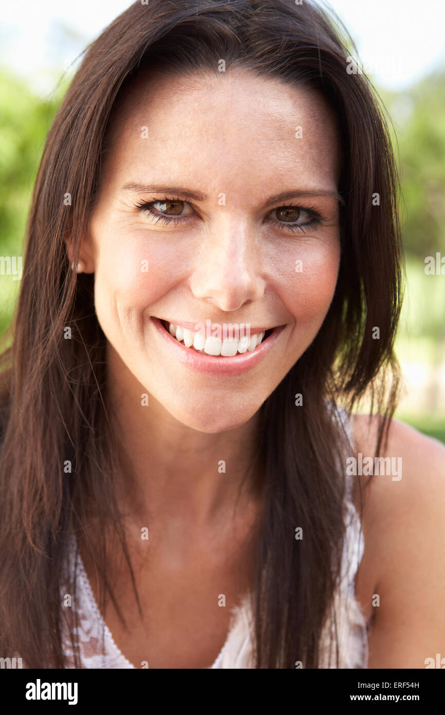 Head And Shoulders Portrait Of Smiling Woman Stock Photo - Alamy