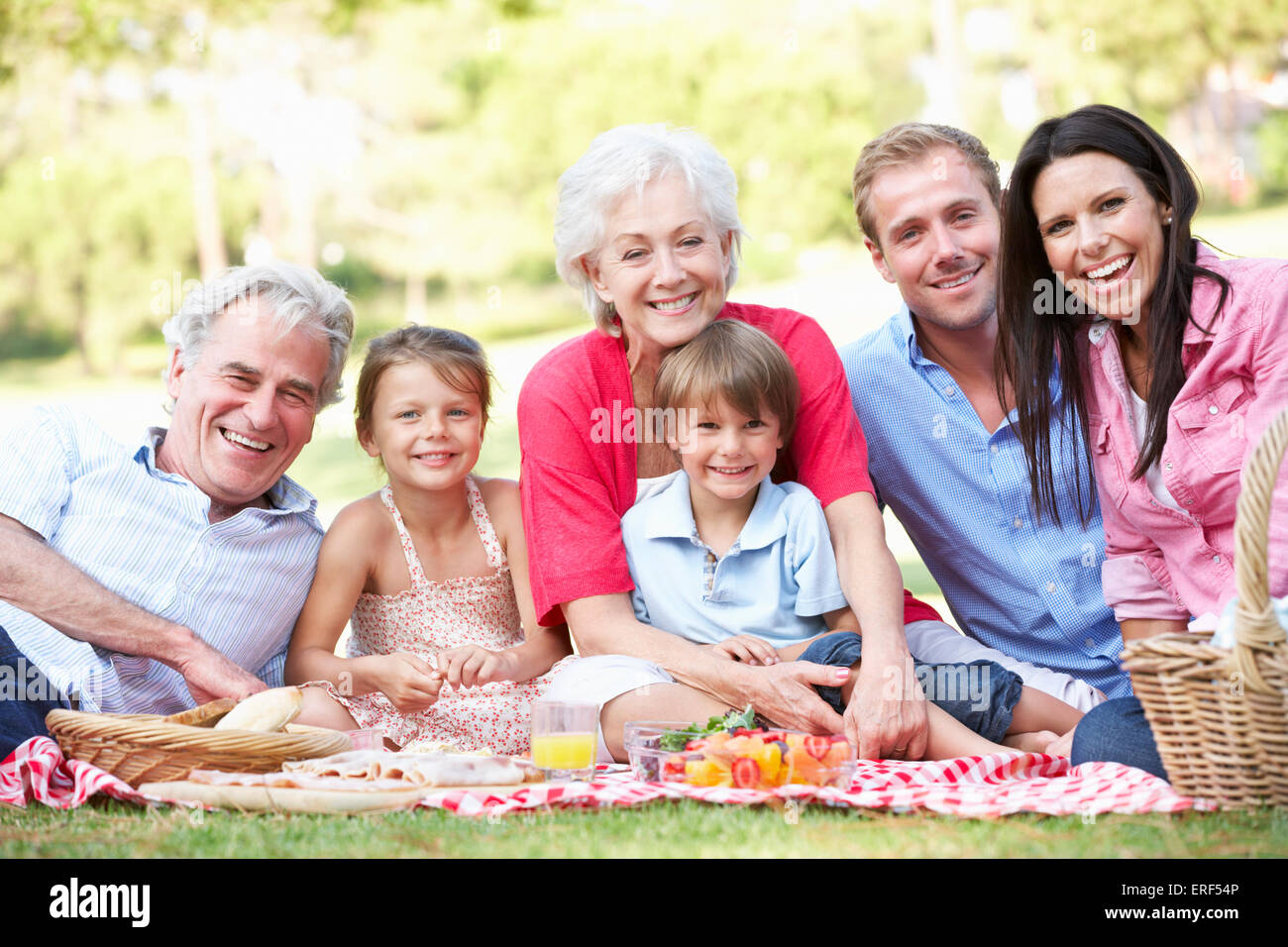 Multi Generation Family Enjoying Picnic Together Stock Photo - Alamy Multi Generation Family Enjoying Picnic Together Stock Photo - Alamy